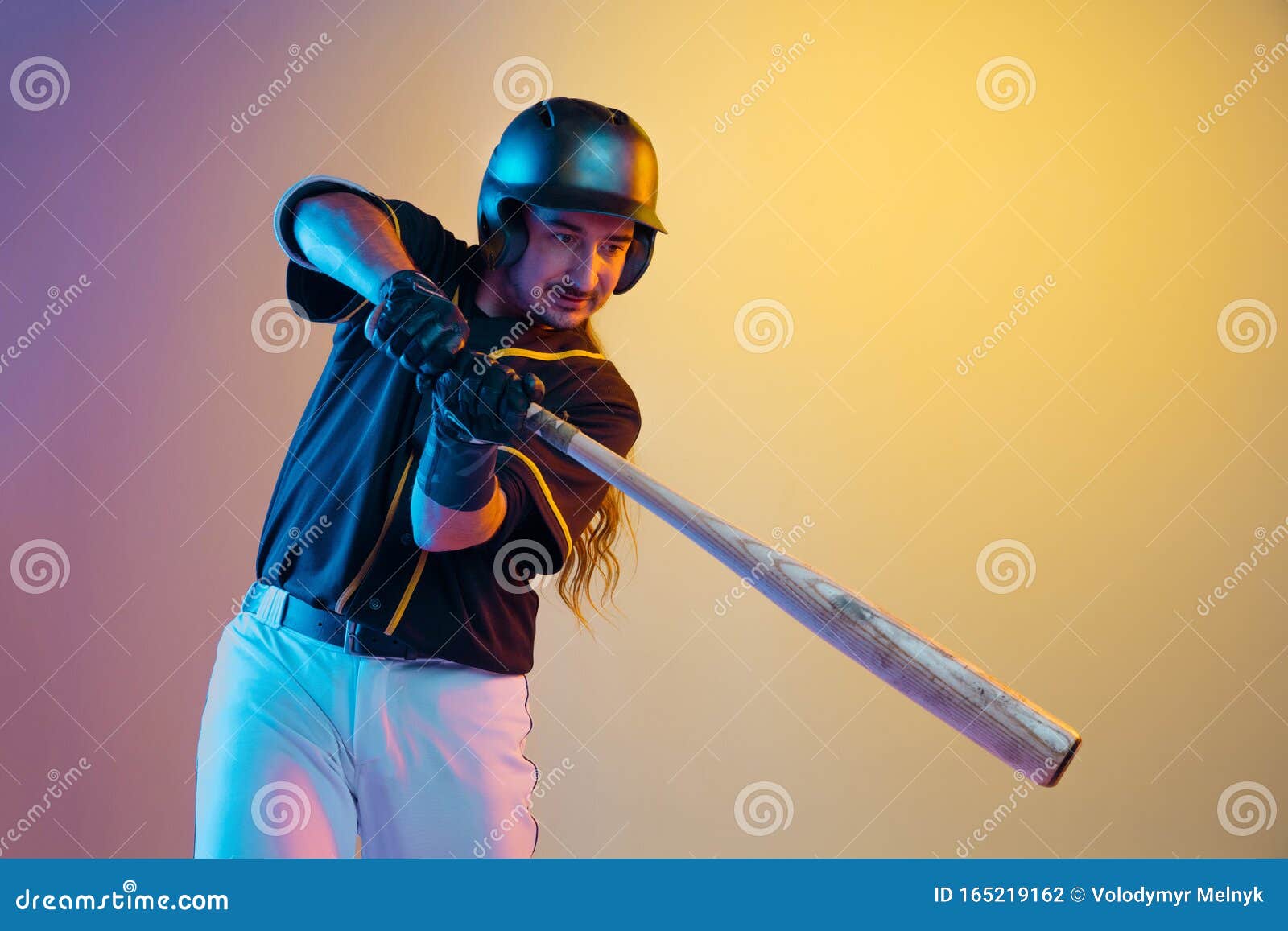 Baseball Player, Pitcher in a Black Uniform Practicing on Gradient ...