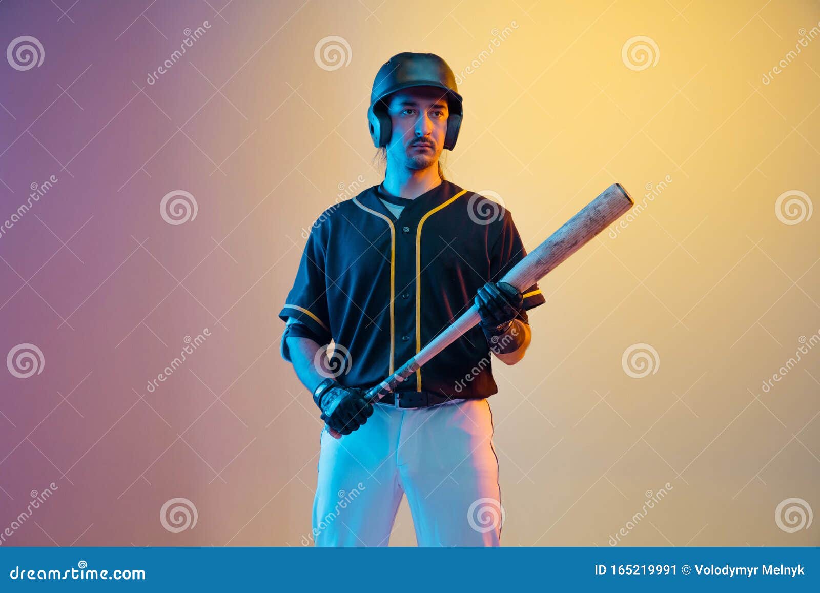 Baseball Player, Pitcher in a Black Uniform Practicing on Gradient ...