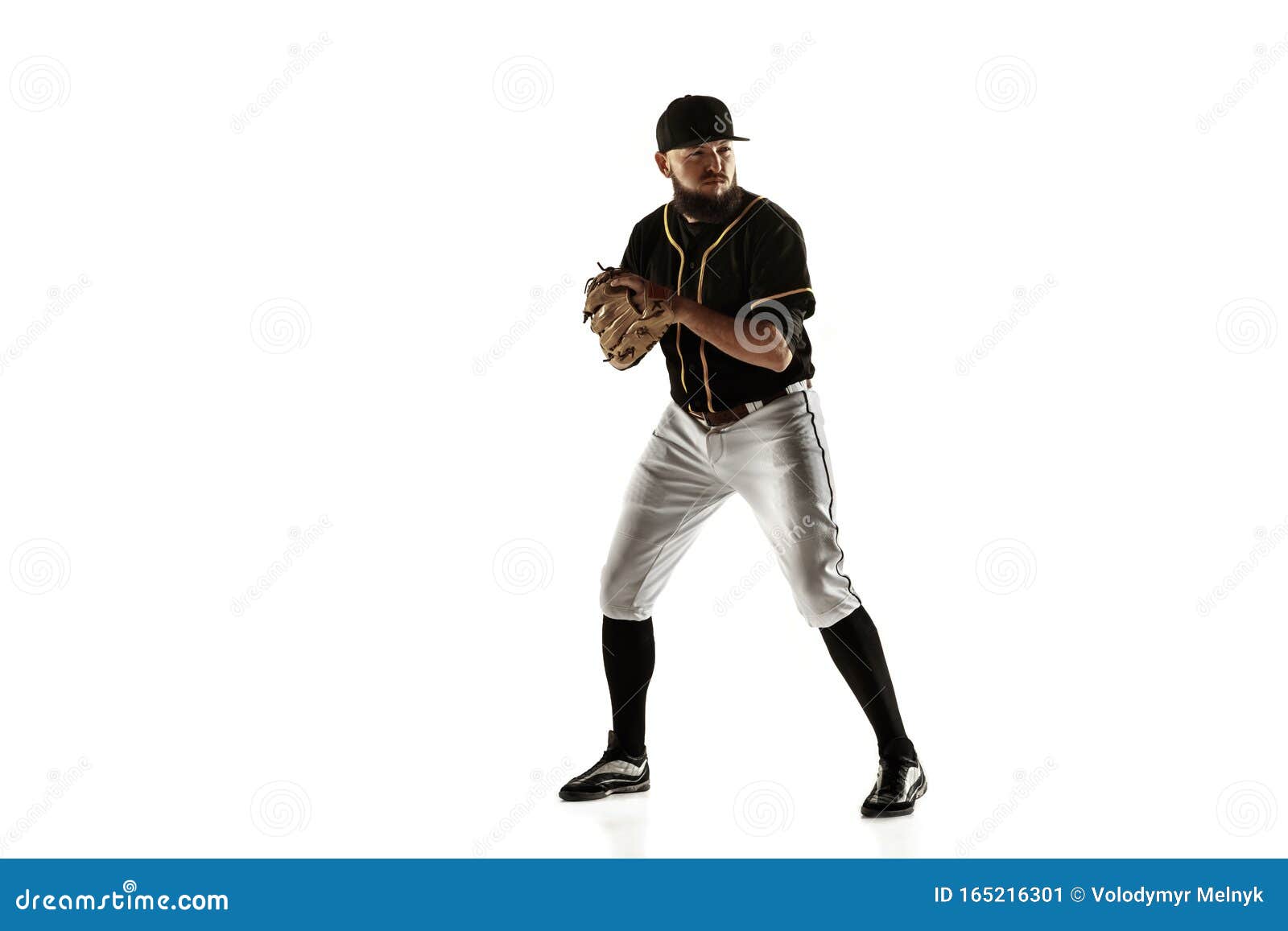 Baseball Player, Pitcher in a Black Uniform Practicing on a White ...