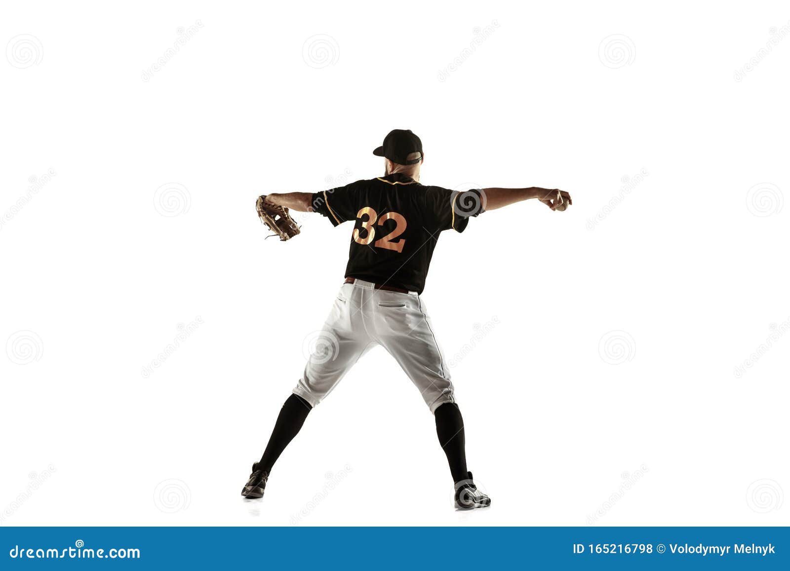 Baseball Player, Pitcher in a Black Uniform Practicing on a White ...