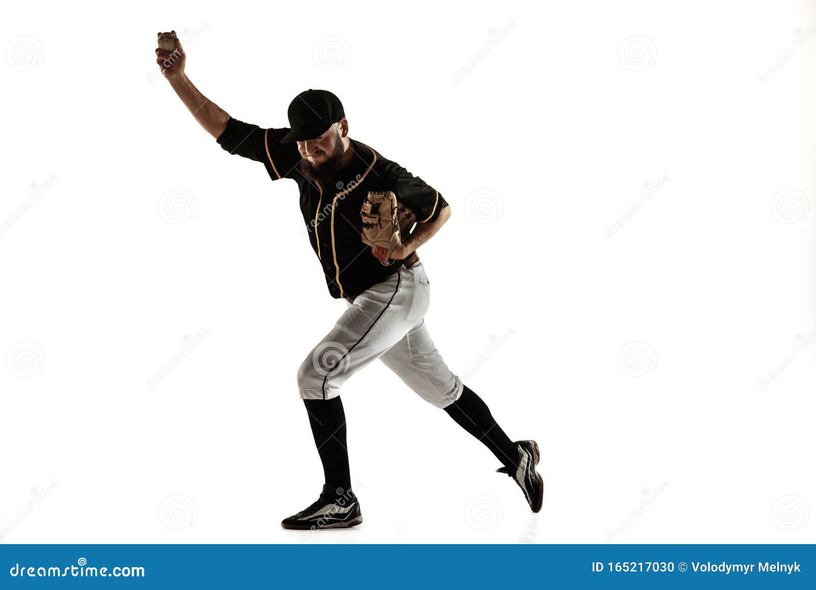 Baseball Player, Pitcher in a Black Uniform Practicing on a White ...