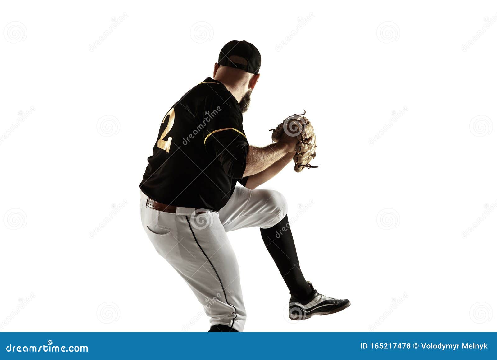 Baseball Player, Pitcher in a Black Uniform Practicing on a White ...
