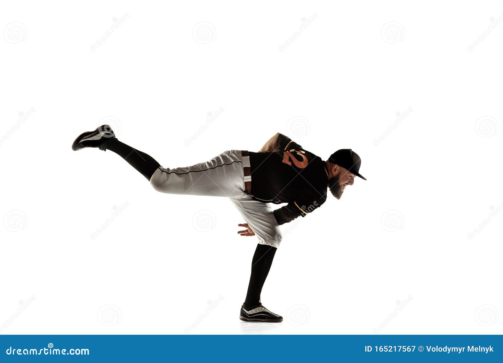 Baseball Player, Pitcher in a Black Uniform Practicing on a White ...