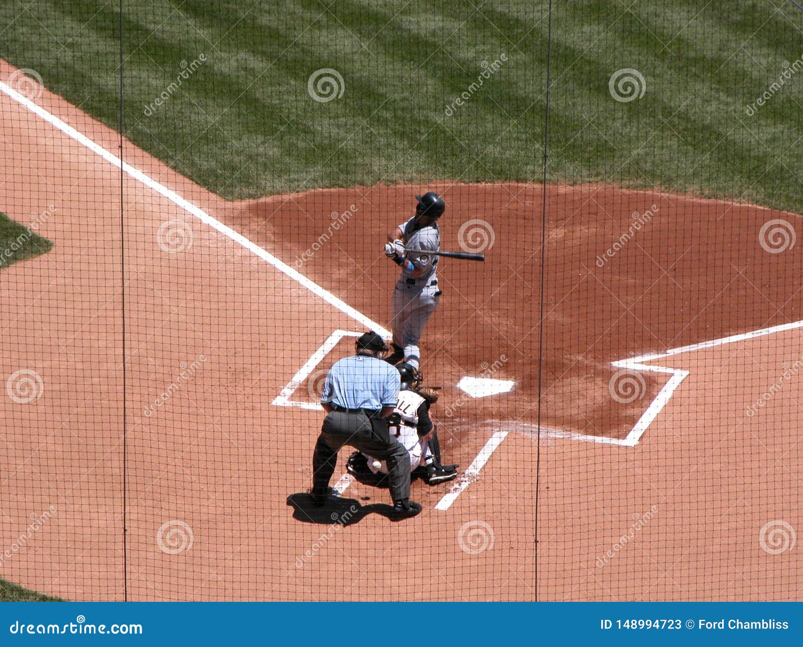 Baseball Player Swinging and Missing a Pitched Baseball Editorial Stock ...