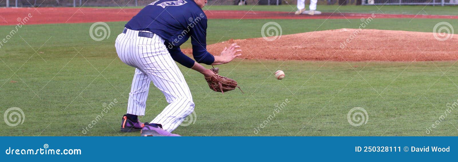 Baseball Third Baseman Making a Play on the Infield Stock Image - Image ...