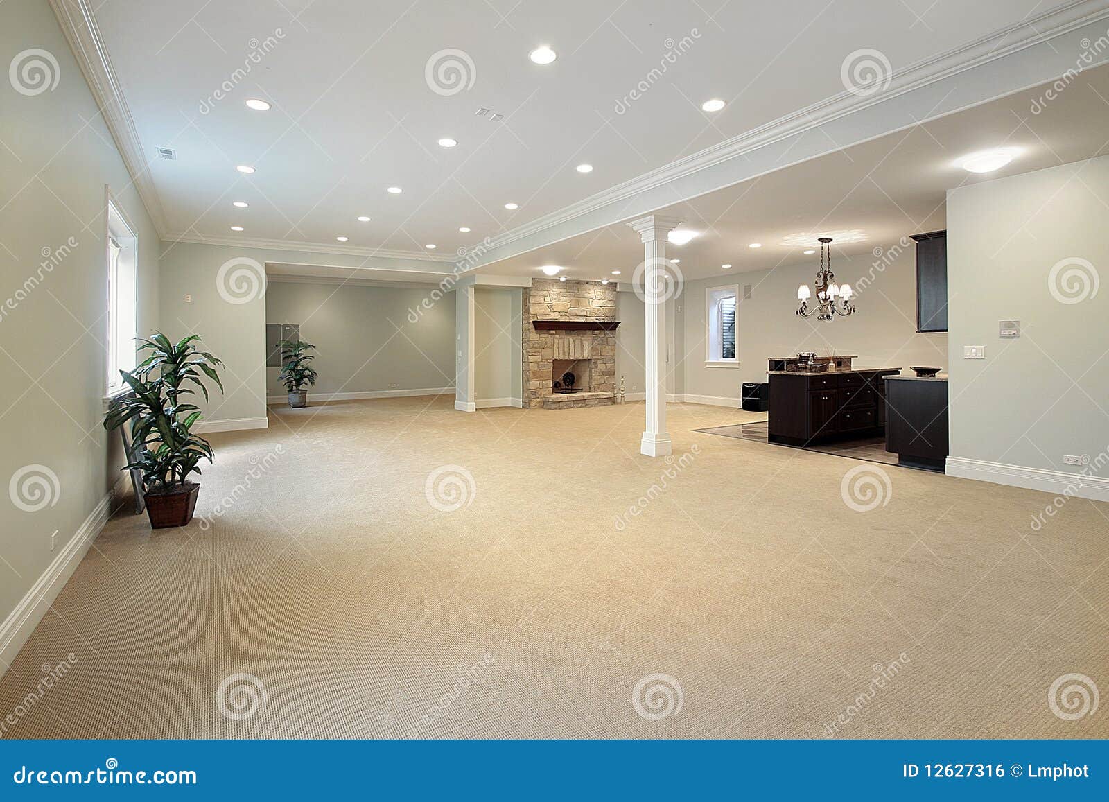 Basement Iwth Stone Fireplace Stock Photo - Image of carpet, floor ...