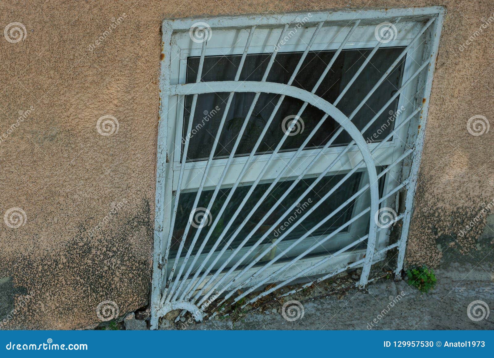 Basement Window Behind an Iron Grate at the Sidewalk Stock Photo ...