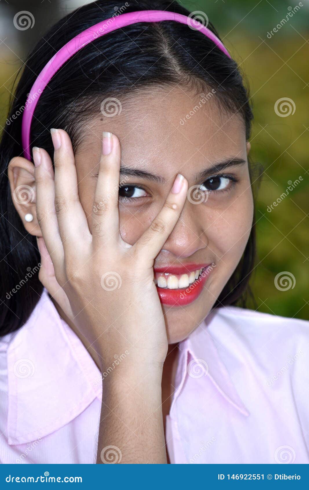A Bashful Teenager Girl stock image. Image of shyness - 146922551