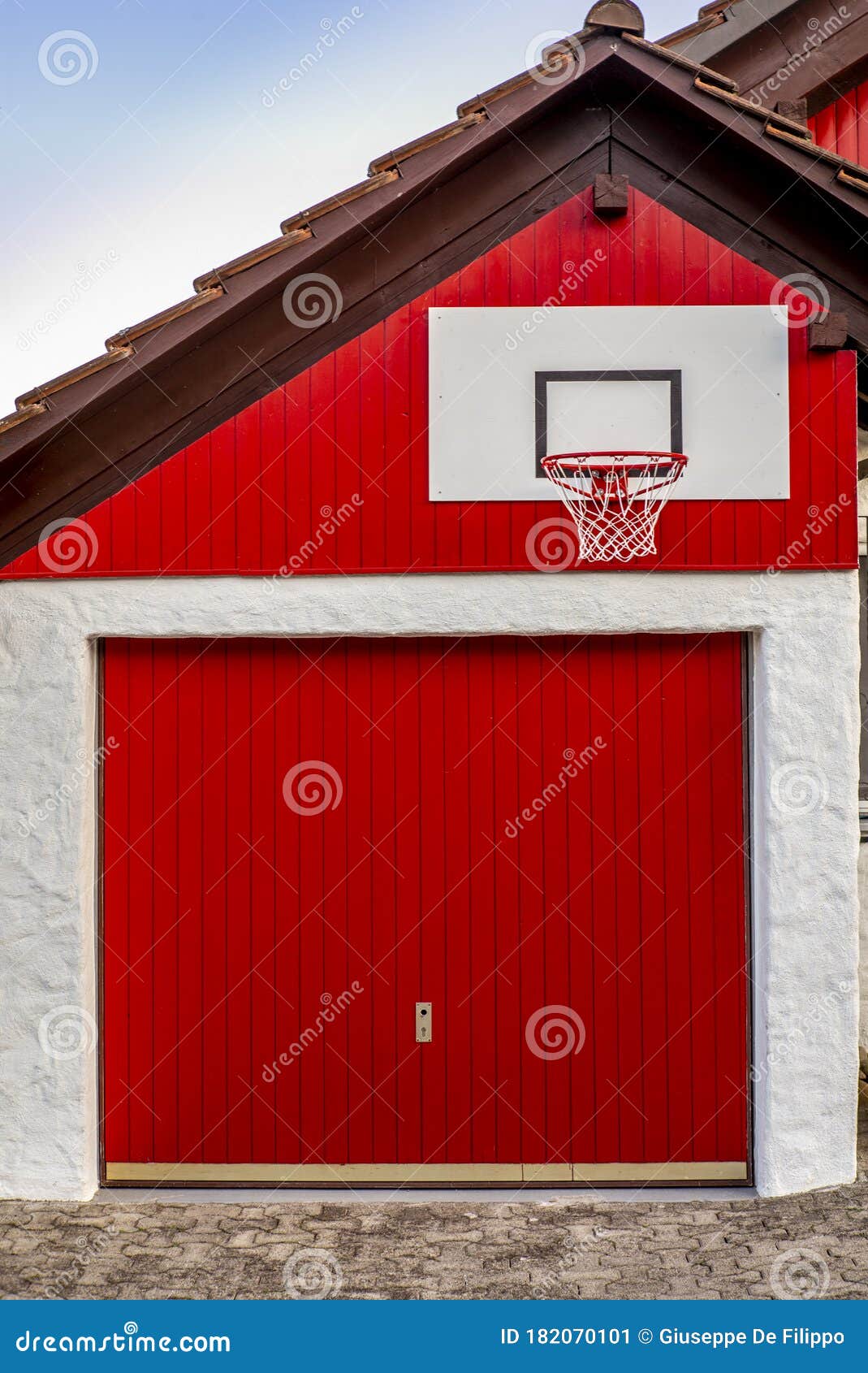 A Basic Basketball Playing Field in Front of a House Stock Image ...
