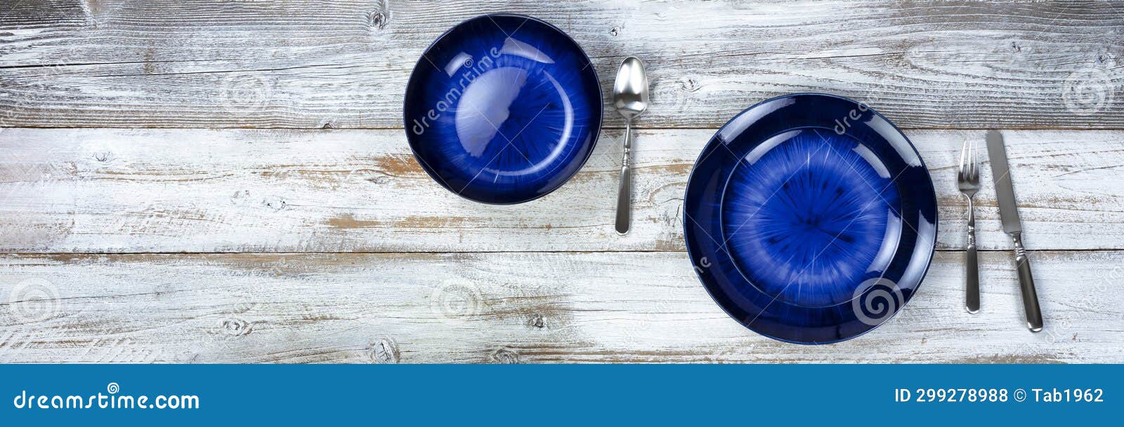 Basic Dinner Table Setting of an Empty Main Dark Blue Dish and Bowl ...