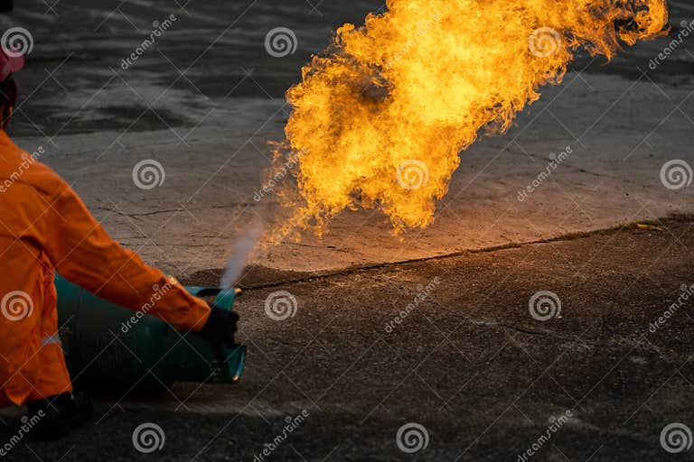 Basic Fire Fighting and Practice of the Emergency. Stock Photo - Image ...