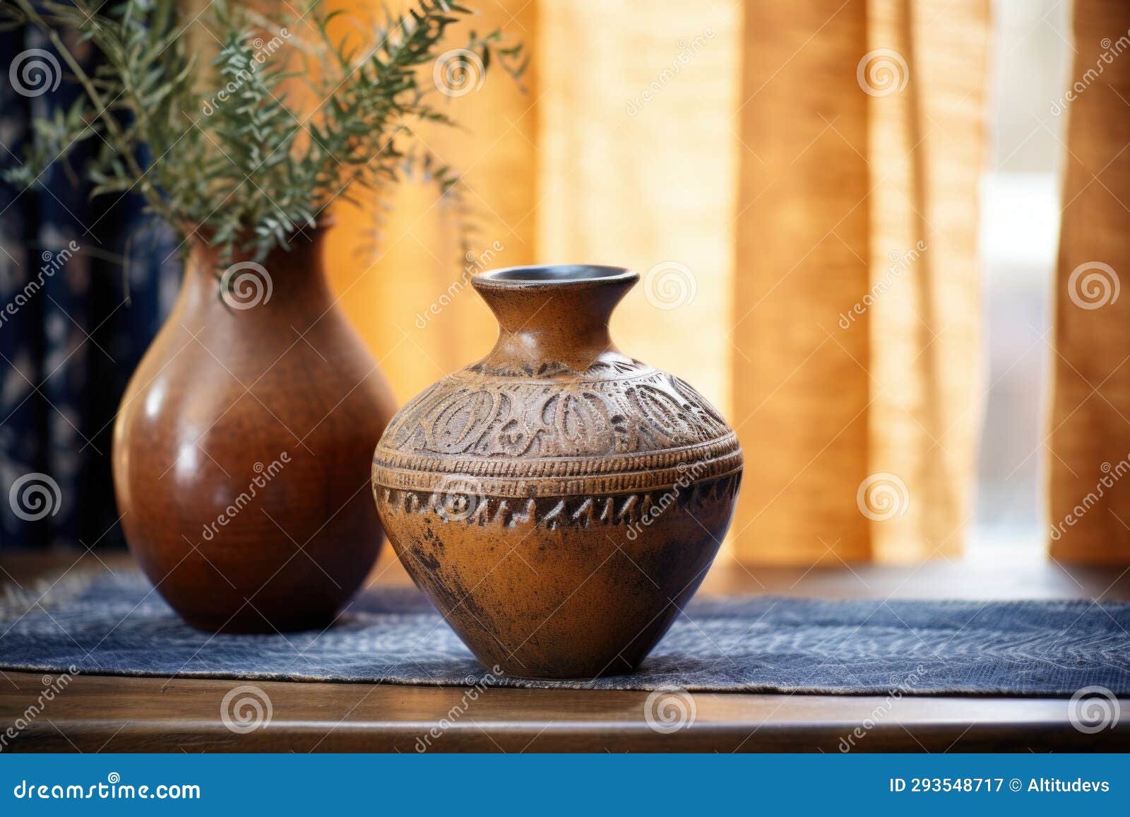 Basic Pottery Piece beside an Elaborate Vase Stock Image - Image of ...