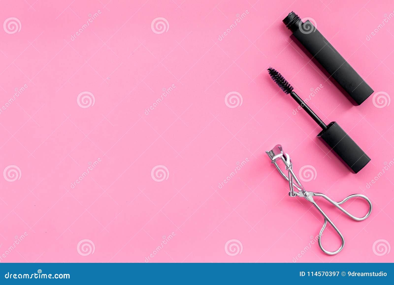 Basic Products for Eyelashes Makeup. Mascara and Eyelash Curler on Pink ...