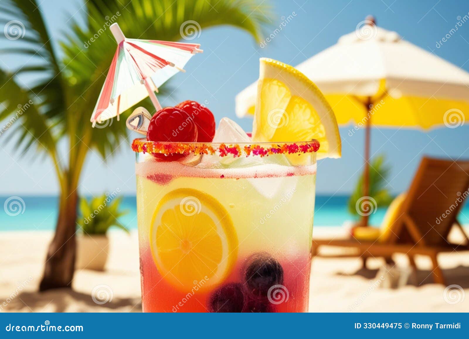 A Glass of Sparkling Water with a Lime Wedge and a Red Rim with a Beach ...