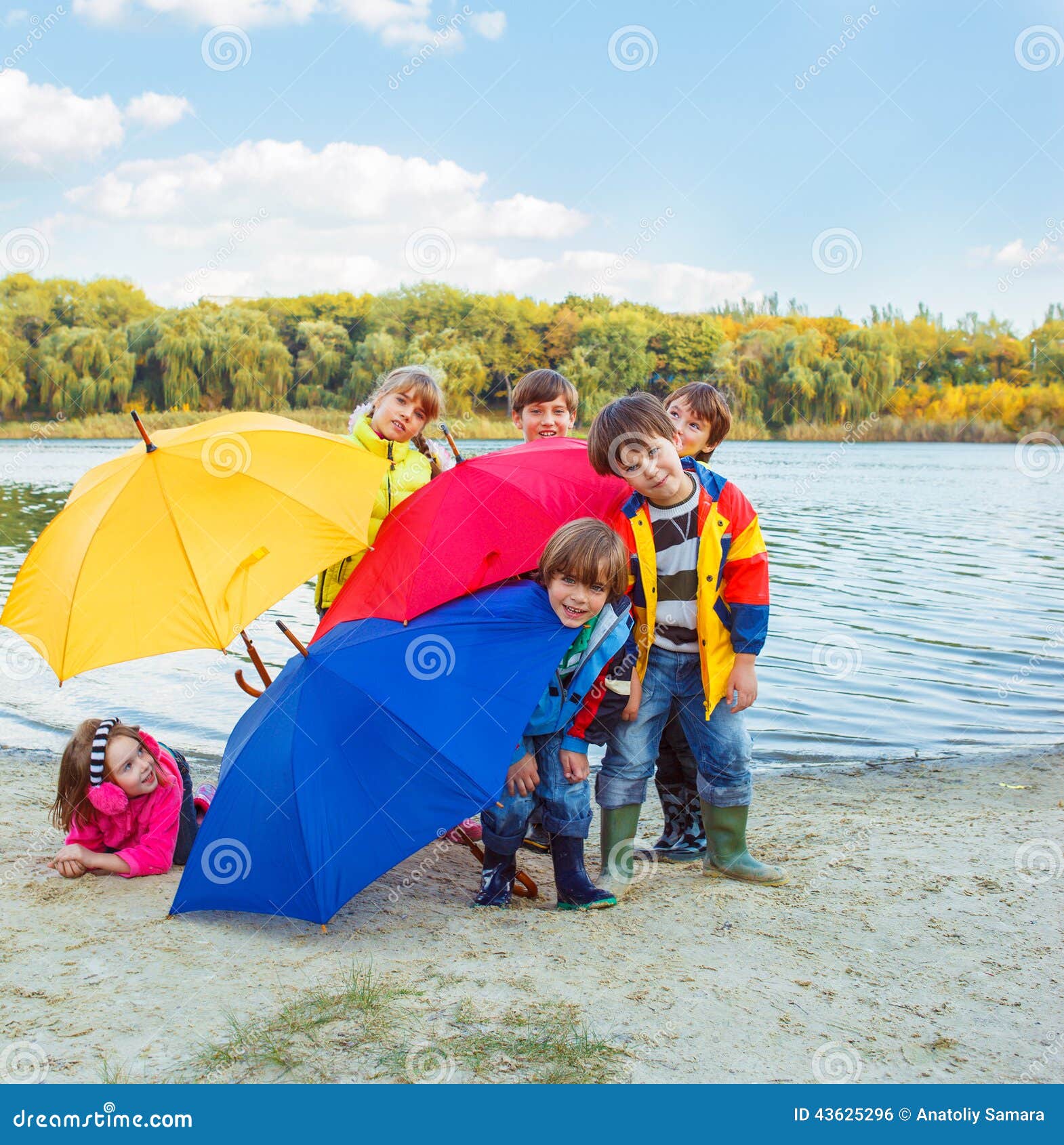 Basic School Students in Rainwear Stock Photo - Image of hold, autumnal ...