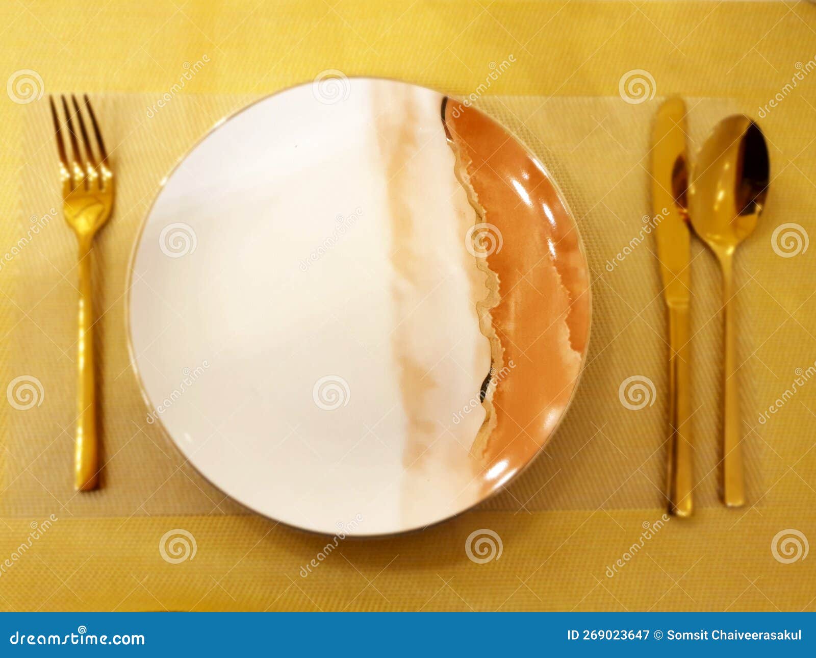 The Basic Table Setting Has a Dinner Plate, Fork, Knife, and Spoon ...