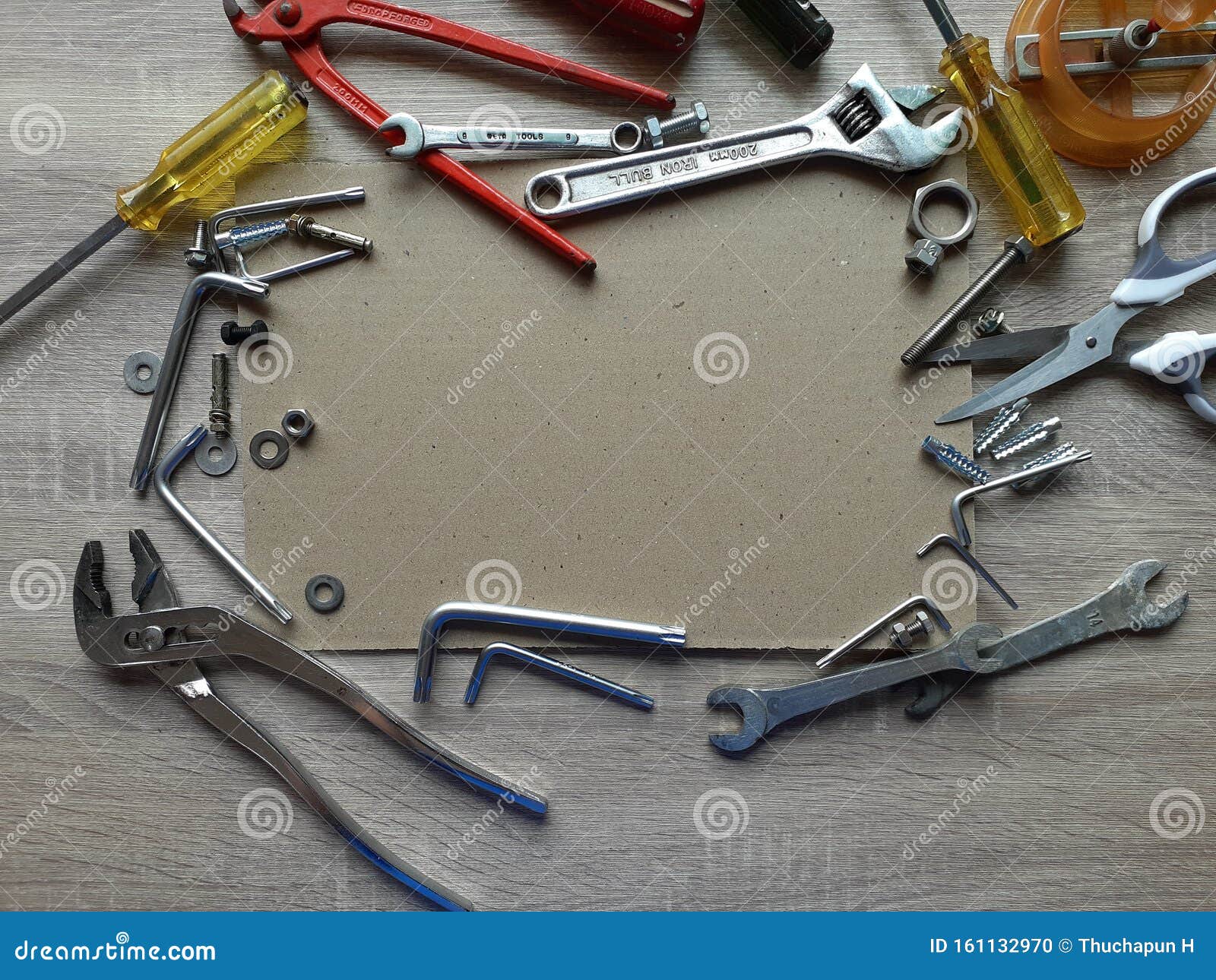 Basic Tools with Blank Card Board on Desk Stock Photo - Image of iron ...