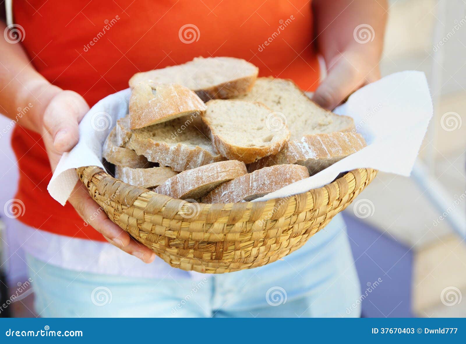 Basket of bread in hands stock image. Image of baked - 37670403