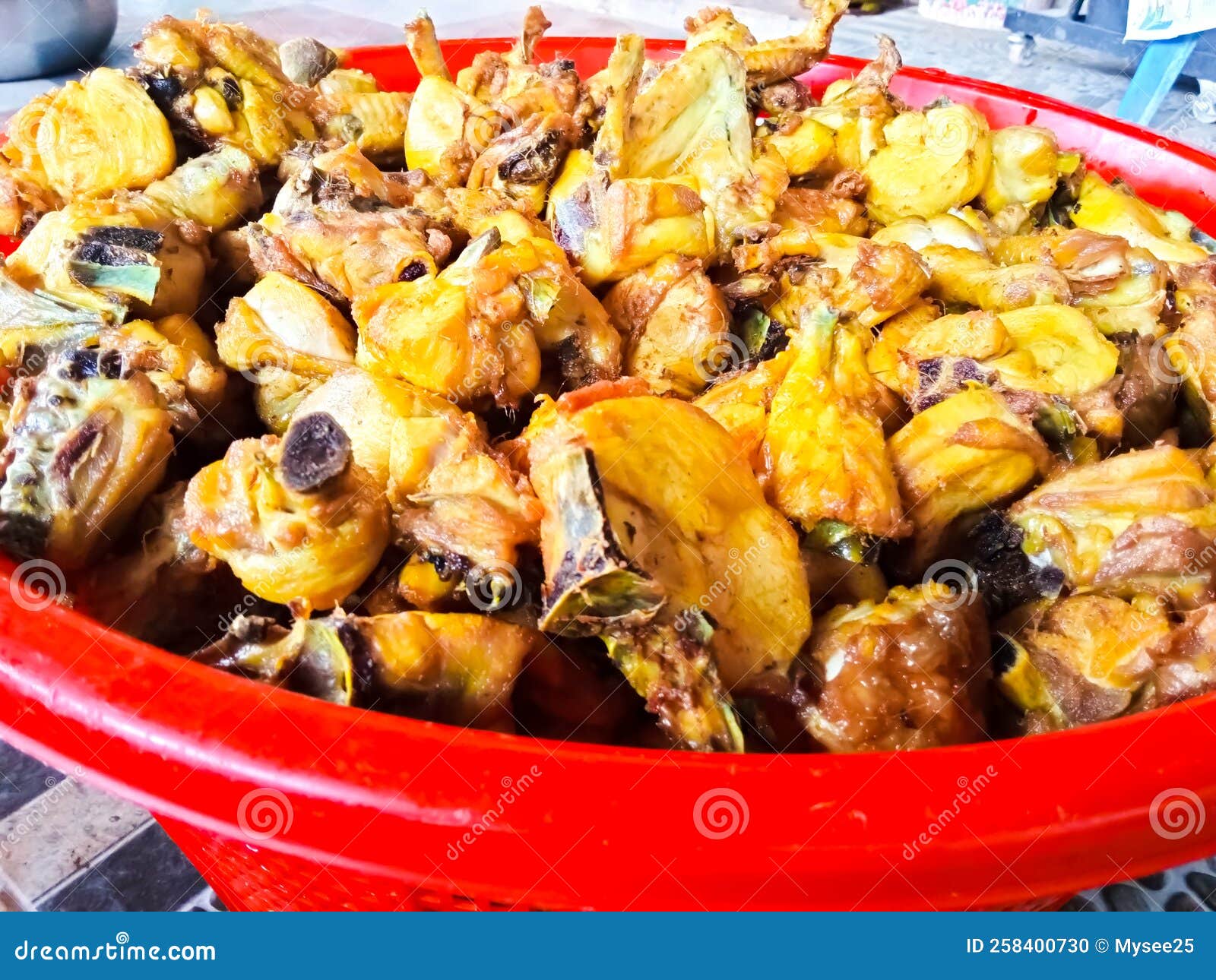 A Basket of Fried Chicken Cut into Small Pieces Stock Photo - Image of ...