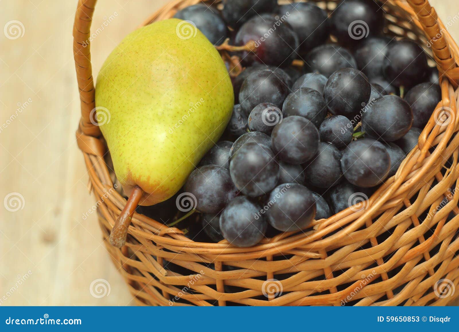 Basket Full of Grapes with Pear on Top Stock Image - Image of ...