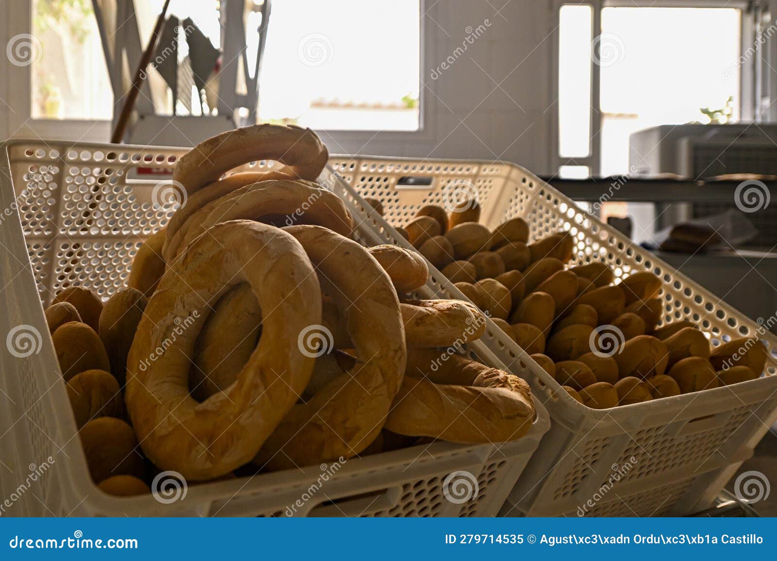 Basket Full of Loaves of Bread Inside the Bakery. Stock Image - Image ...