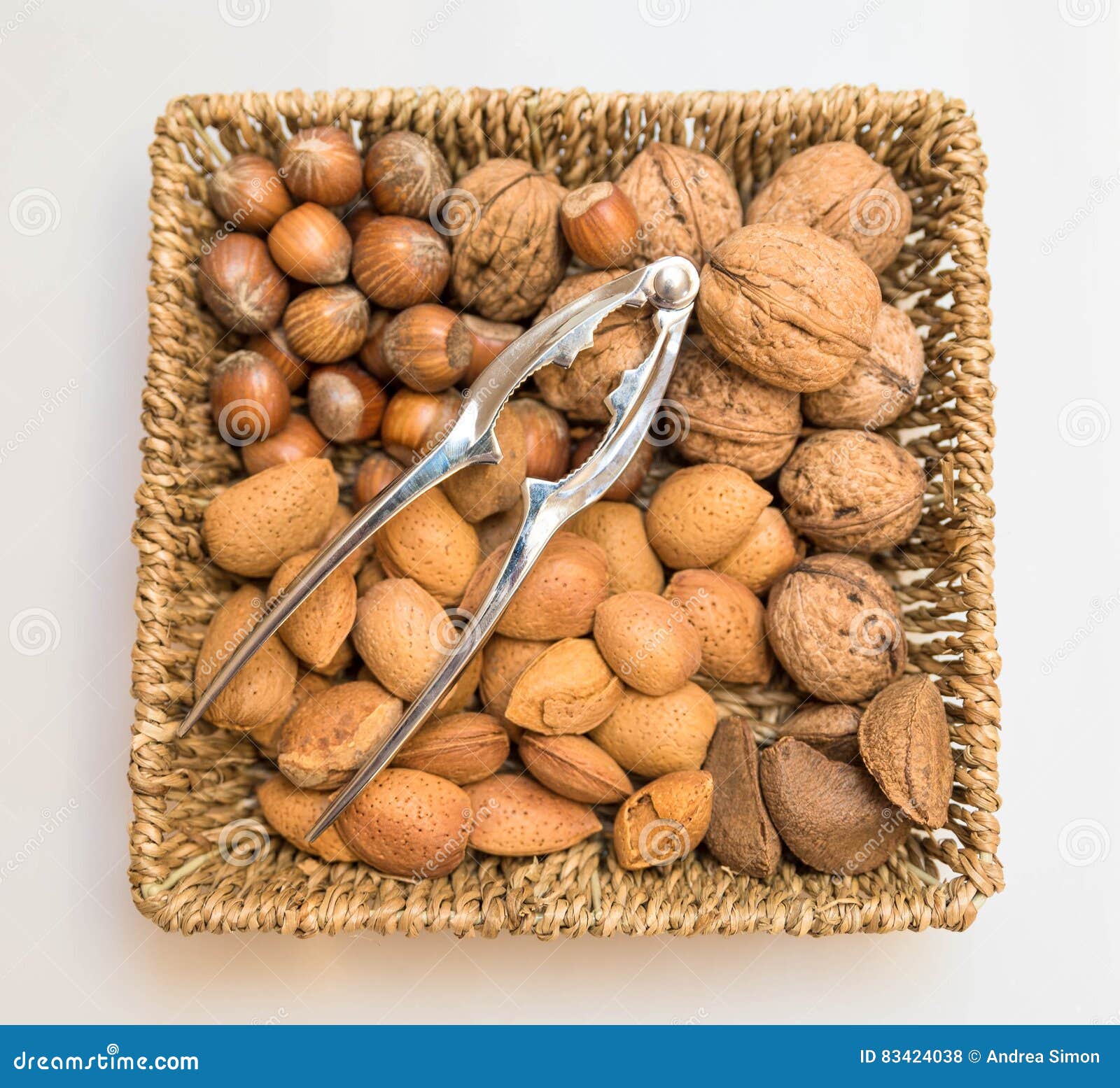 Basket with Nuts and Nutcracker Stock Photo - Image of closeup, meal ...