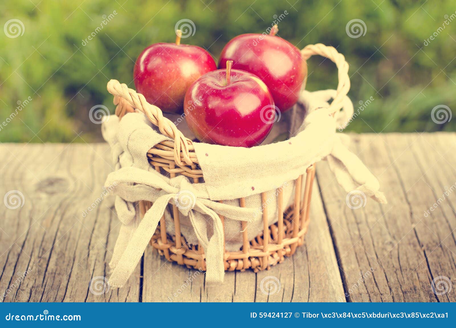 Basket of Red Apples on a Wooden Background Stock Image - Image of ...