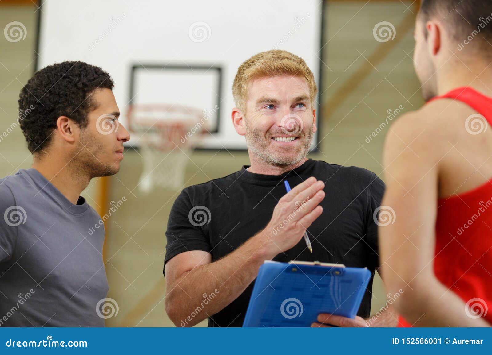 Basketball Coach Talking To Players Stock Image - Image of activity ...