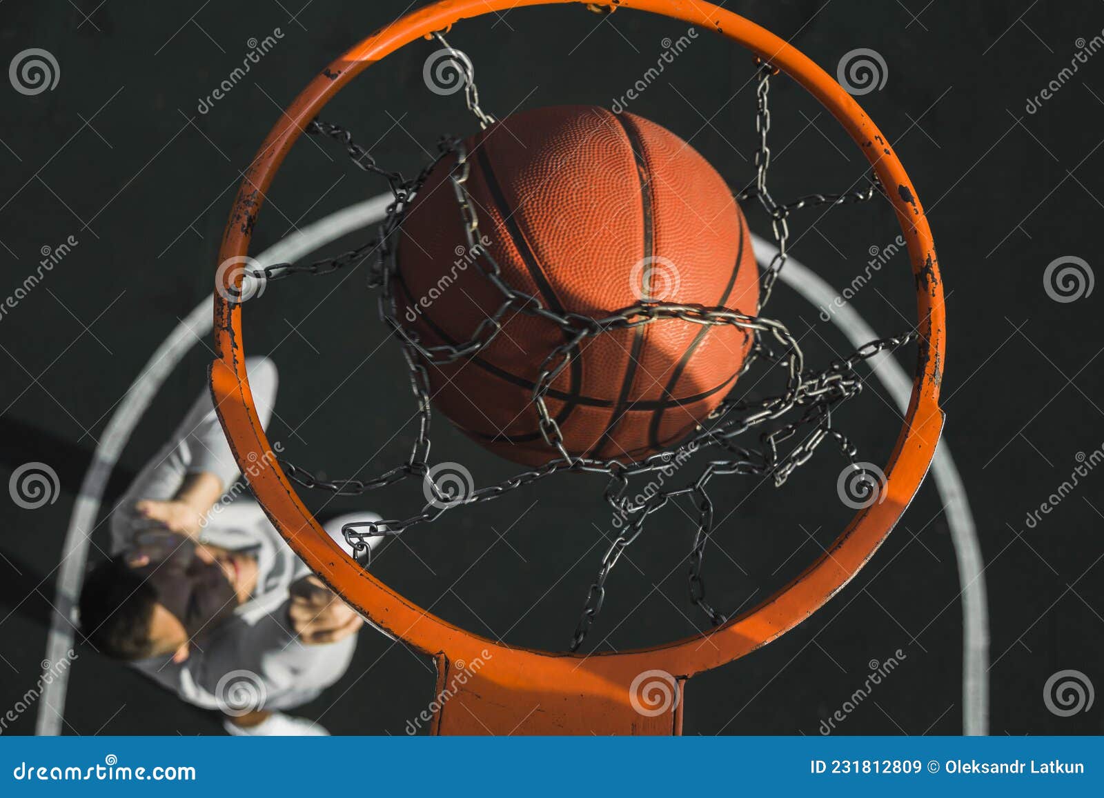 Basketball Falling through Ring. High Quality Photo Stock Image - Image ...