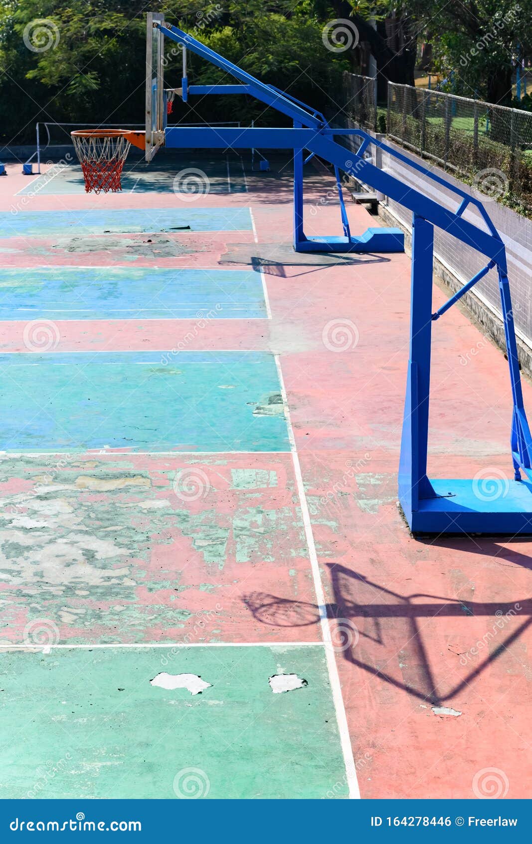 Basketball Frame and Its Shadow in an Outdoor Court Stock Photo - Image ...