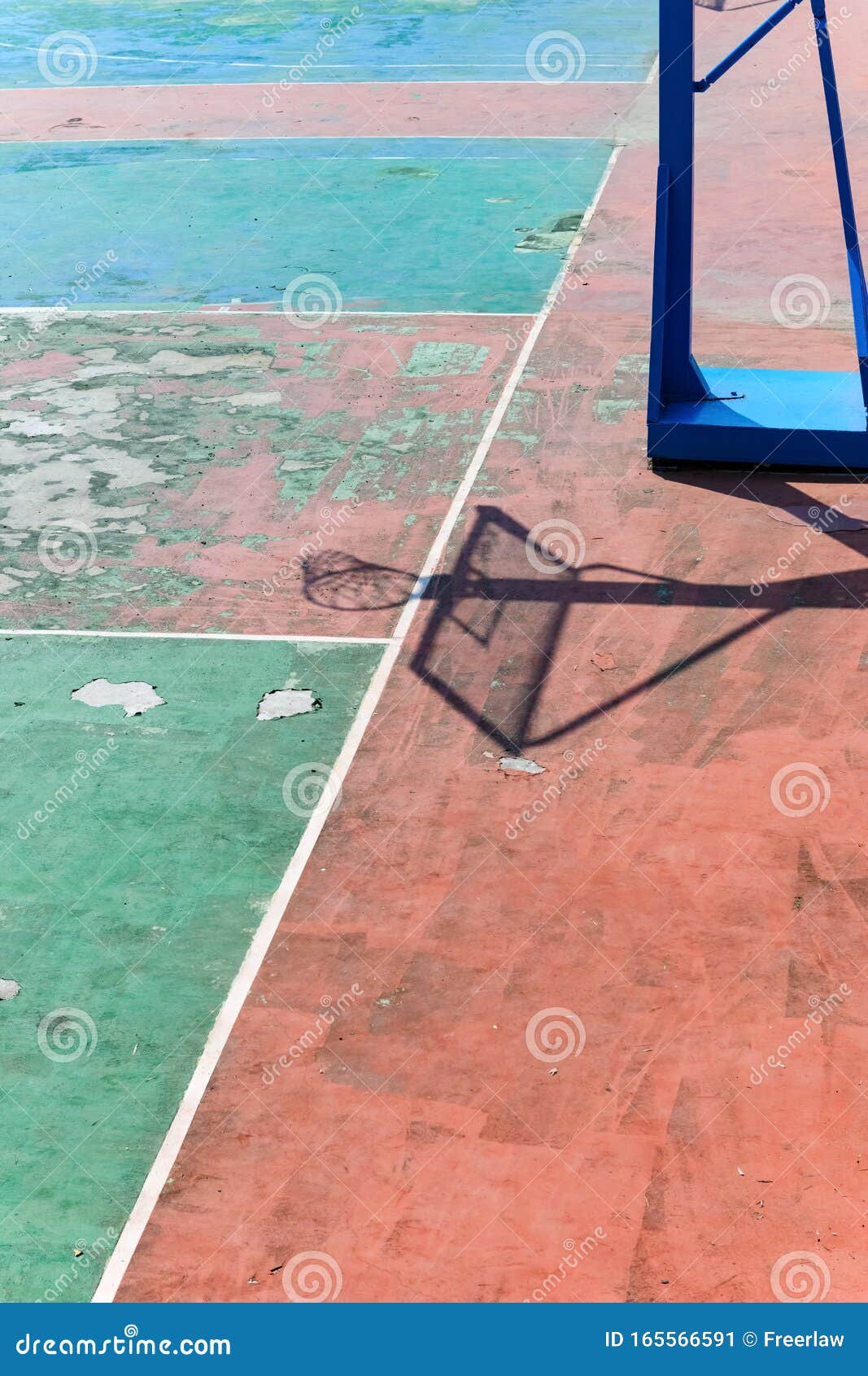 Basketball Frame and Its Shadow in an Outdoor Court Vertical ...