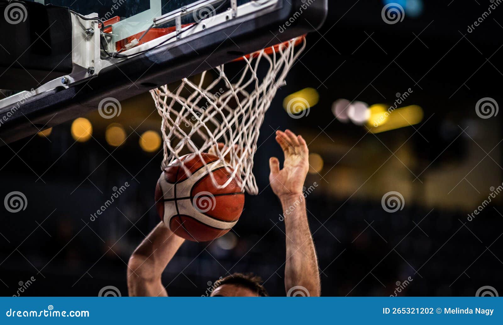Basketball Game Ball in Hoop Stock Photo - Image of audience, effort ...