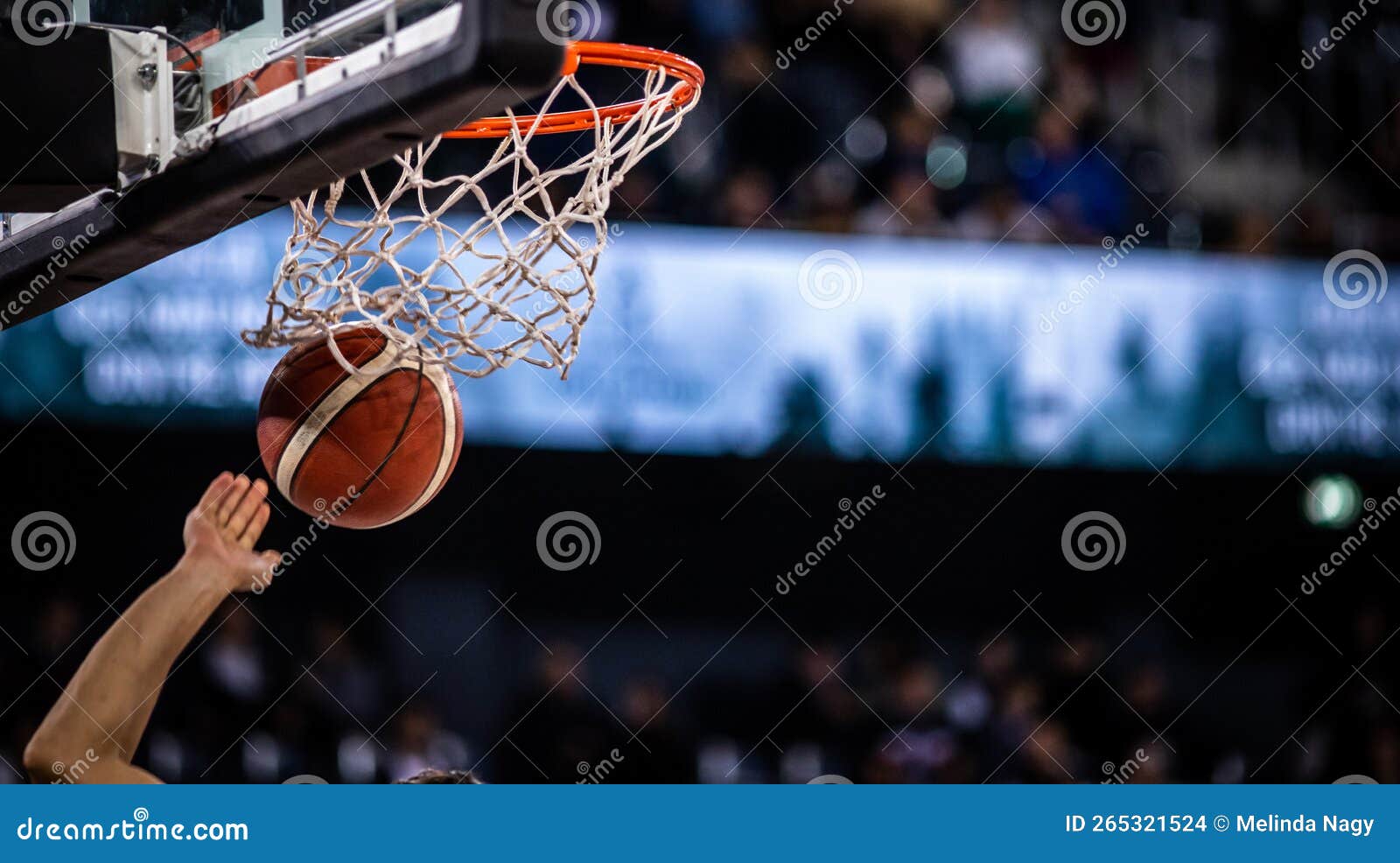 Basketball Game Ball in Hoop Stock Photo - Image of arena, motion ...