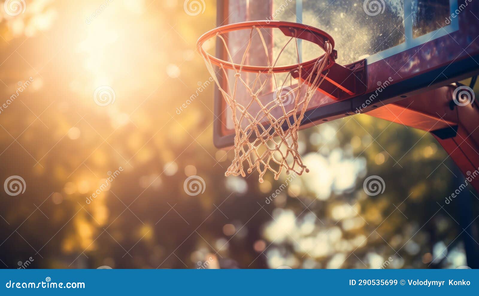 A Basketball Going through the Hoop on a Basketball Court Stock Image ...