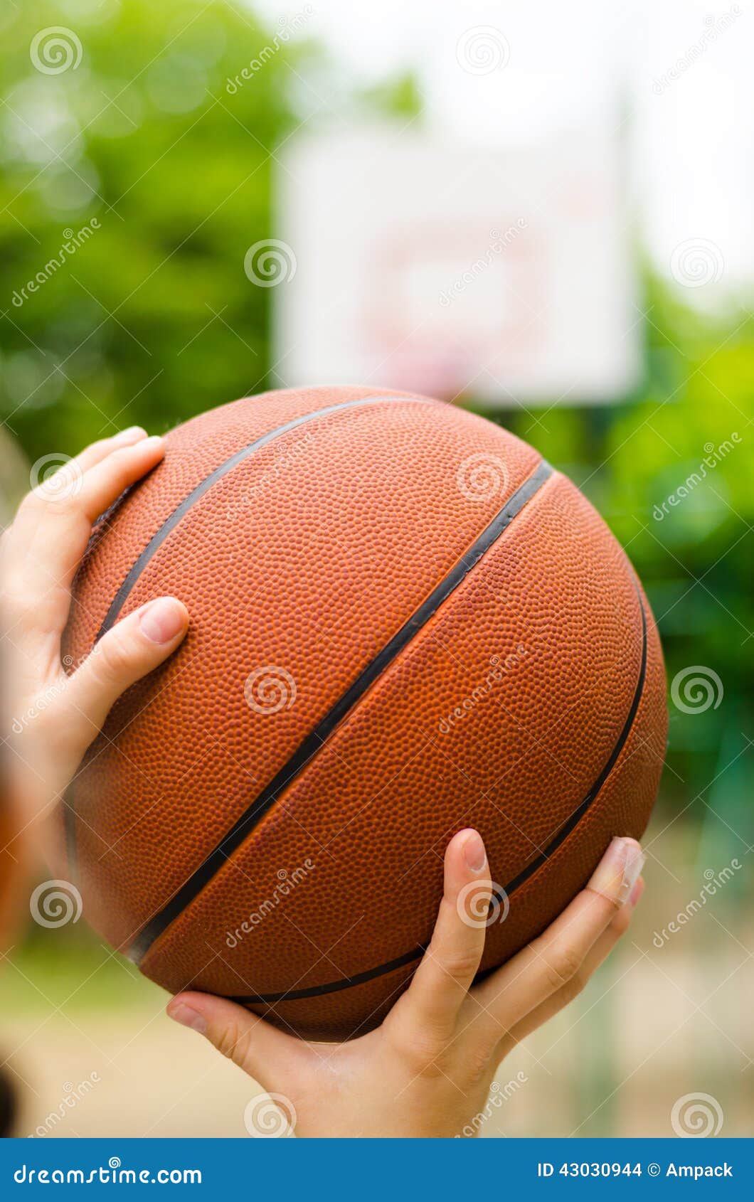 Basketball in hand stock photo. Image of physical, basketball - 43030944