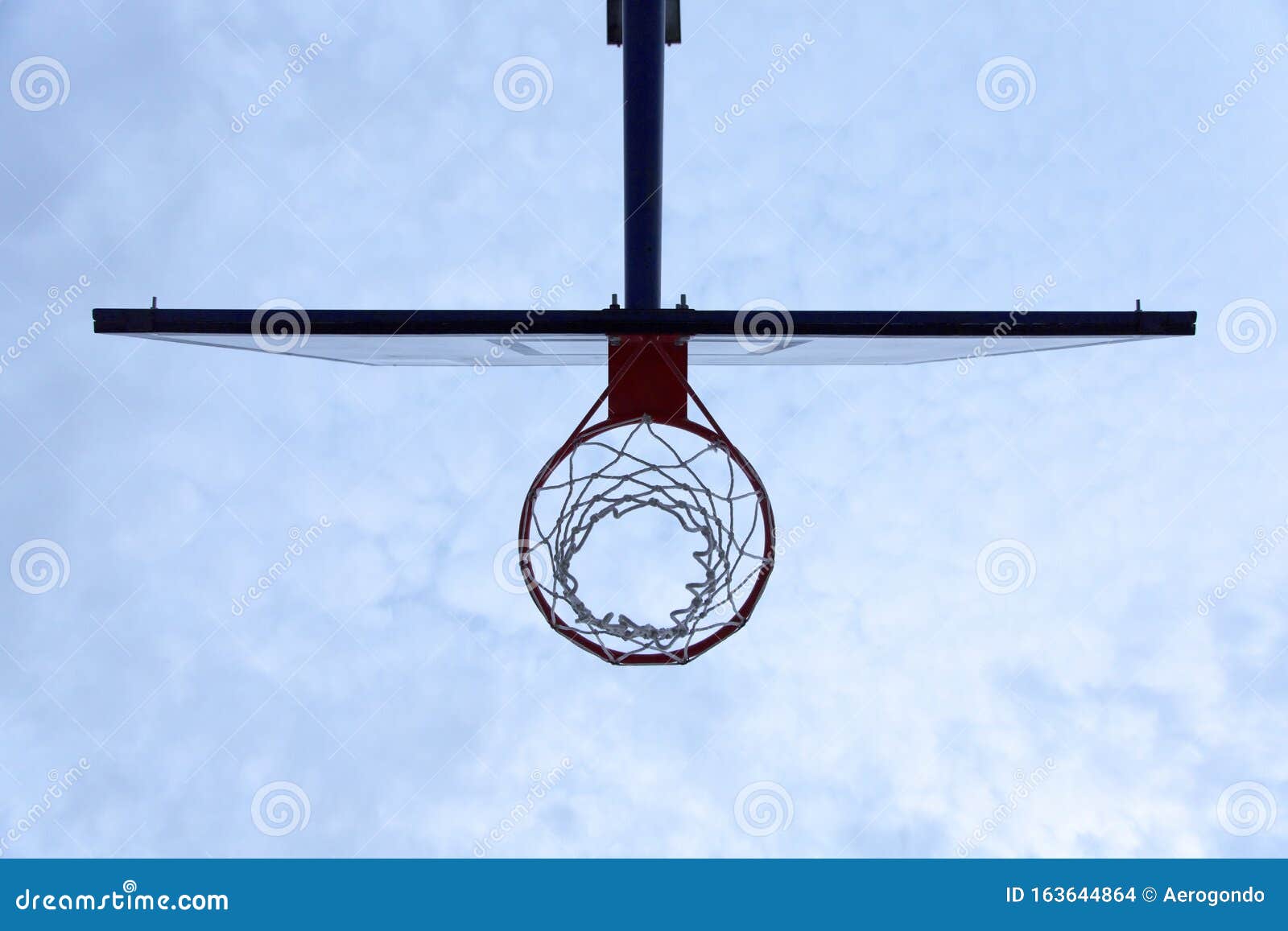 Basketball Hoop View from Below Against the Blue Sky Stock Photo ...