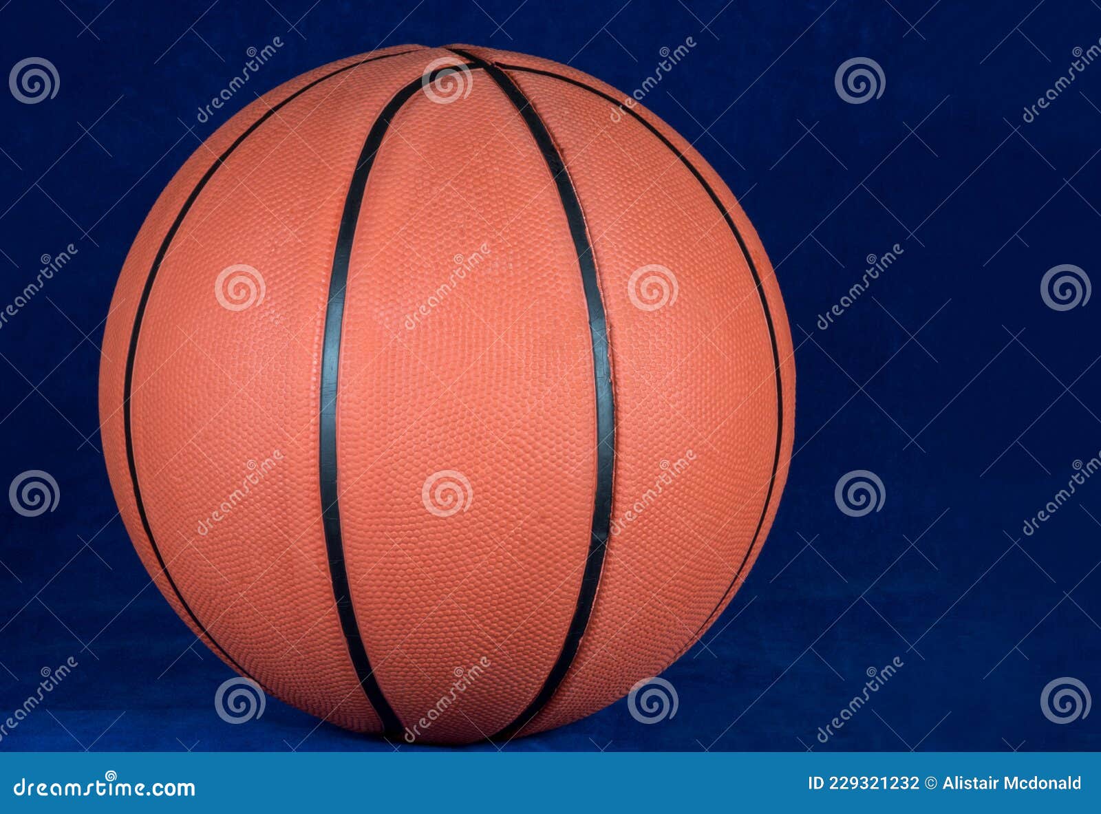 Basketball Isolated on a Blue Background Stock Photo - Image of team ...