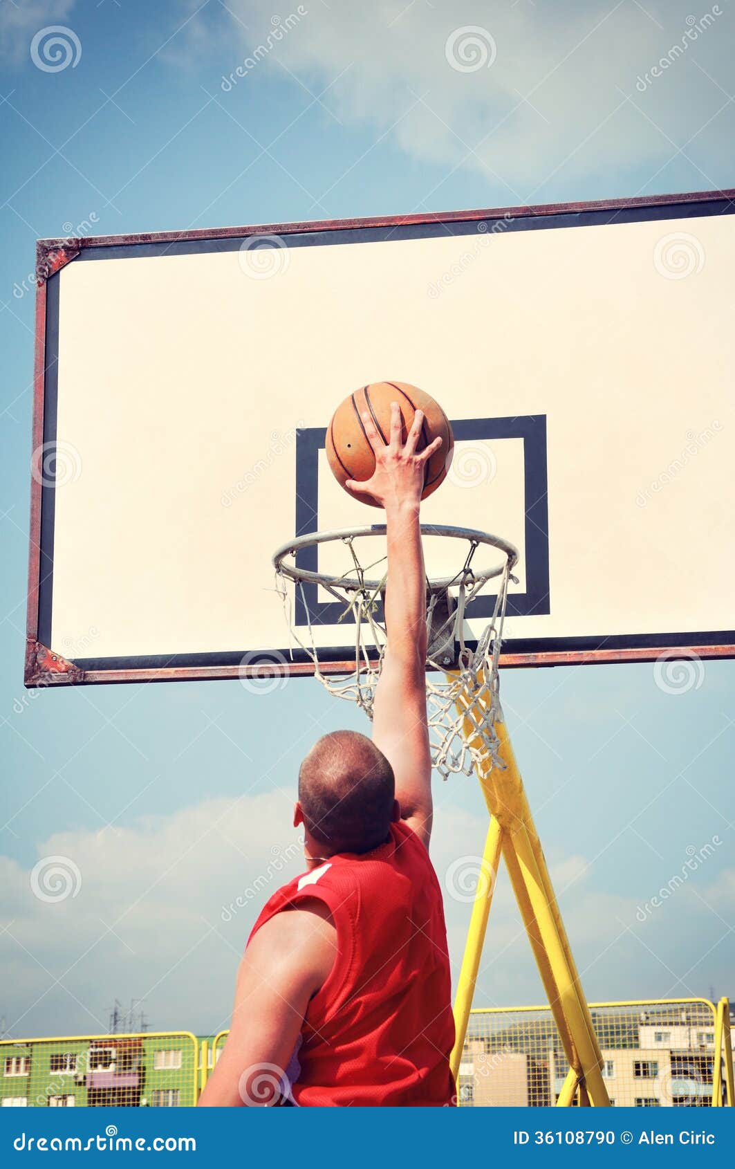 Basketball Player in Action Flying High and Scoring Stock Photo - Image ...