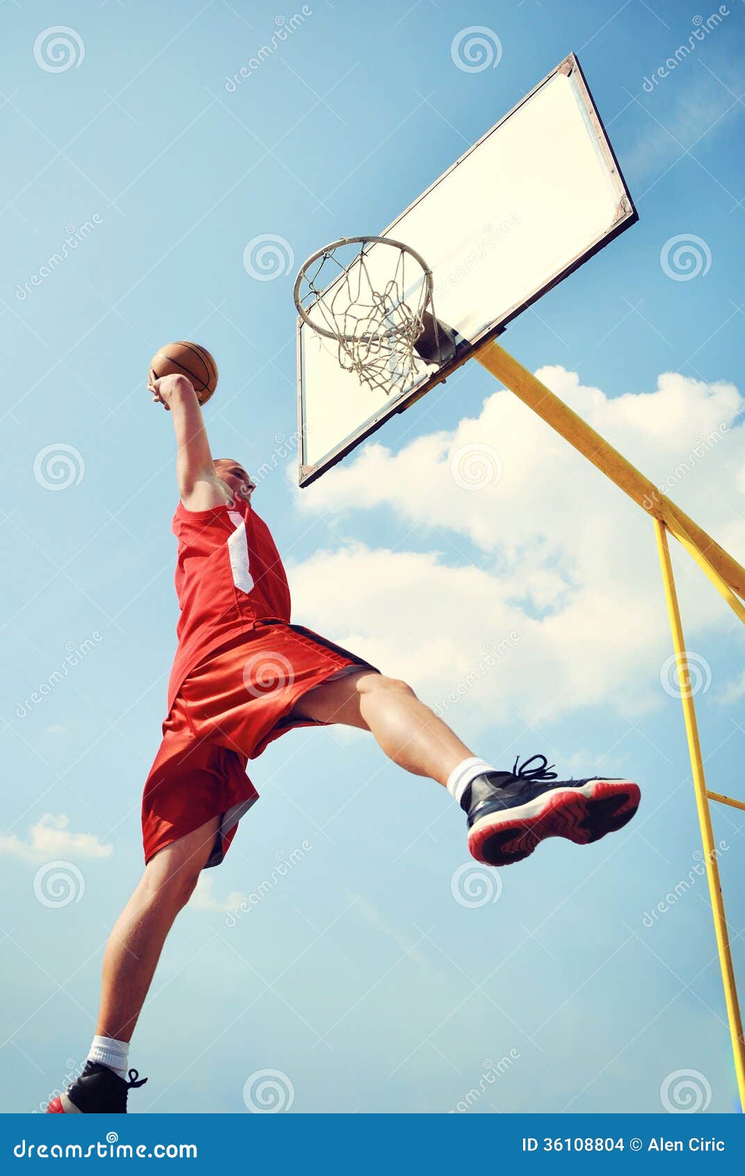 Basketball Player in Action Flying High and Scoring Stock Photo - Image ...