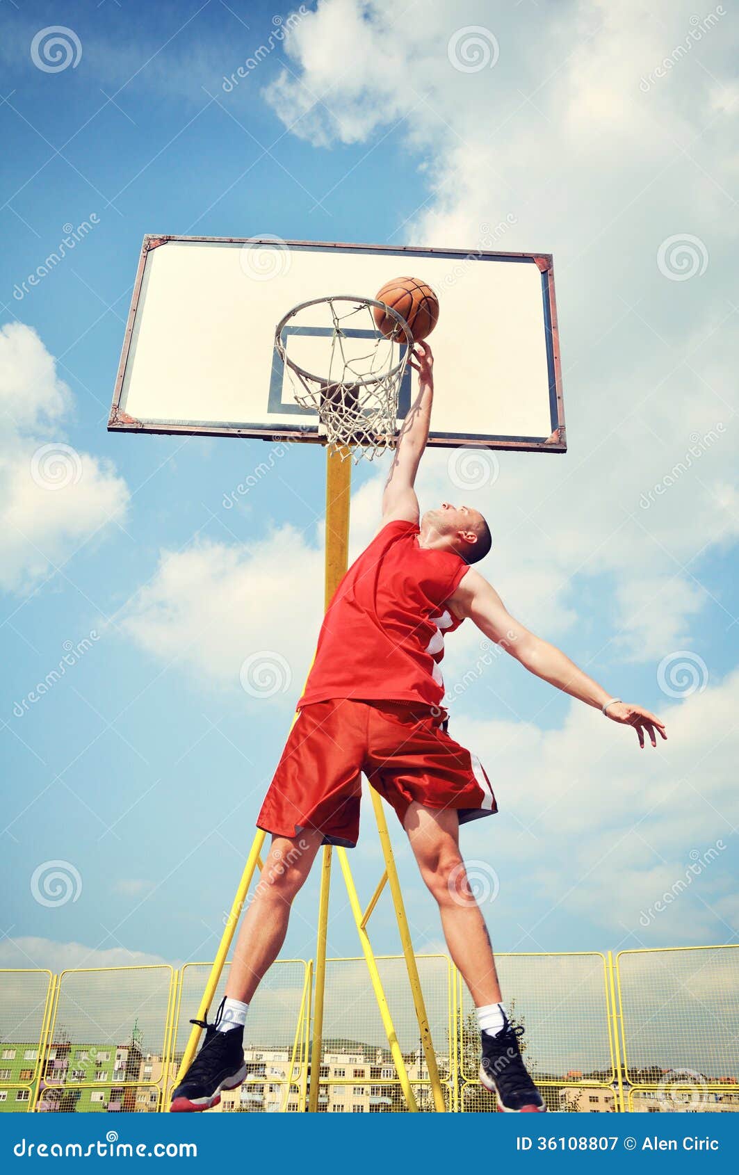Basketball Player in Action Flying High and Scoring Stock Image - Image ...