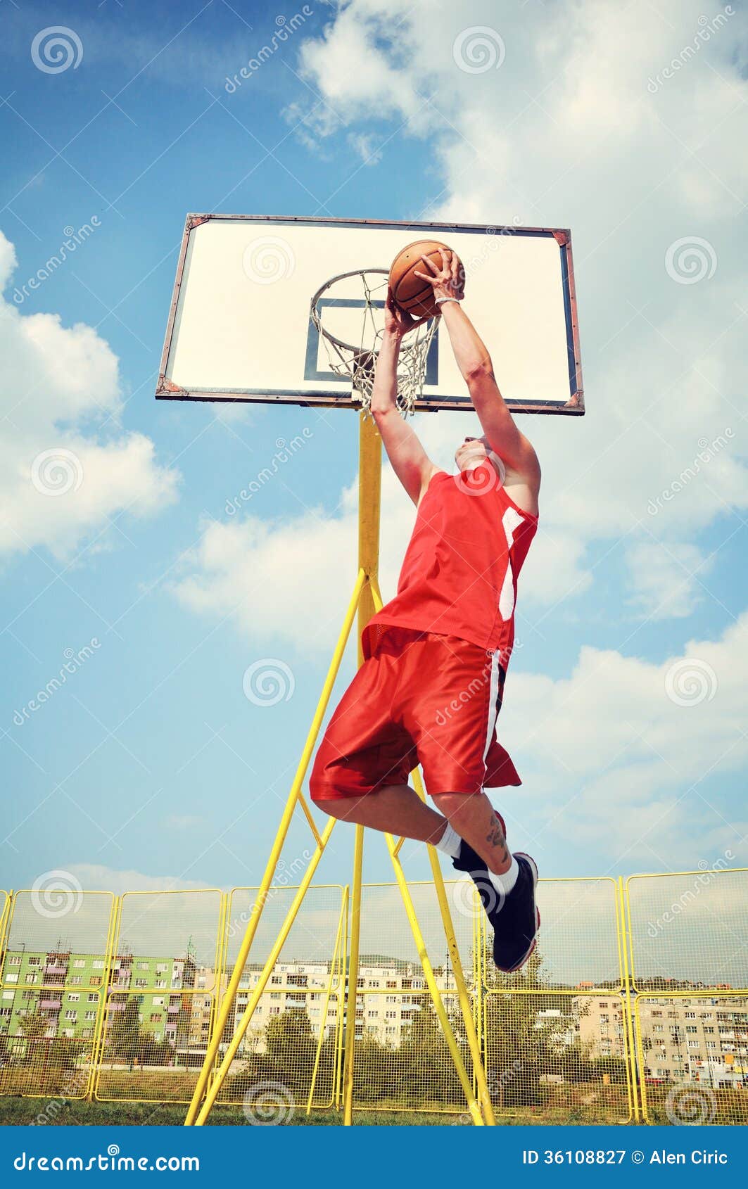 Basketball Player in Action Flying High and Scoring Stock Image - Image ...