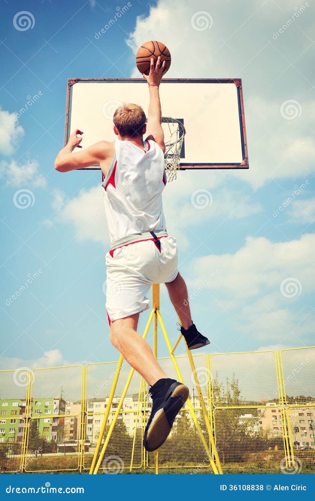 Basketball Player in Action Flying High and Scoring Stock Photo - Image ...