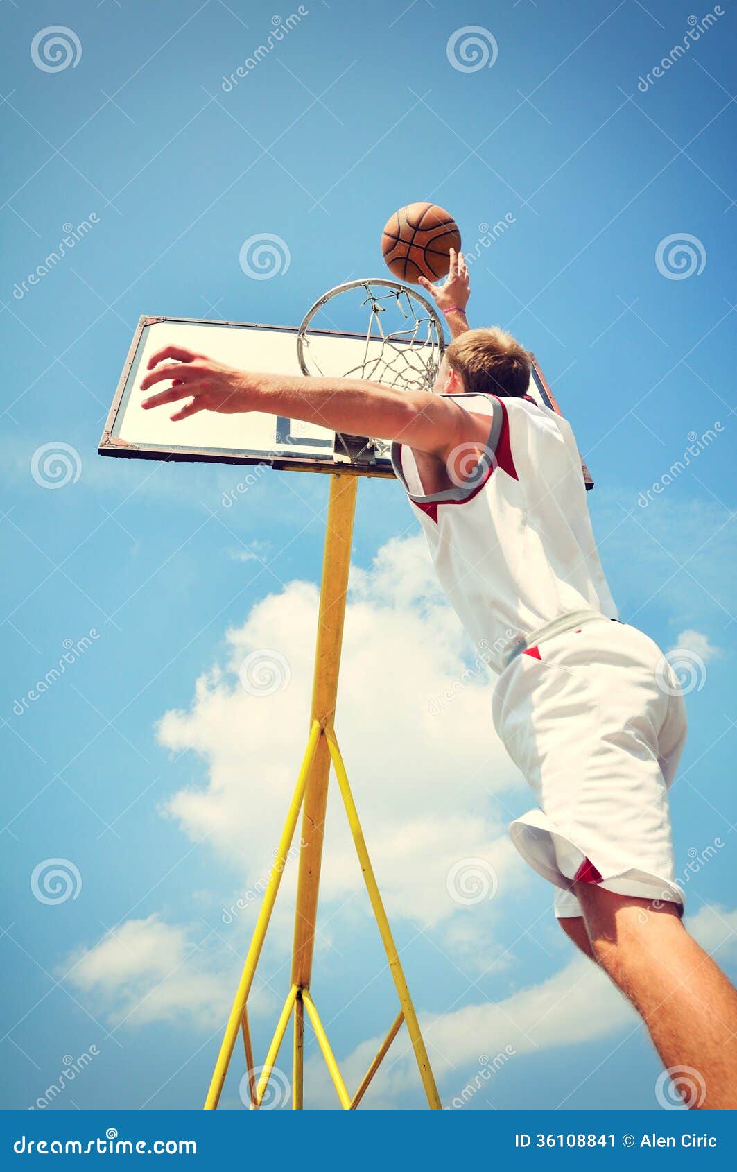 Basketball Player in Action Flying High and Scoring Stock Image - Image ...