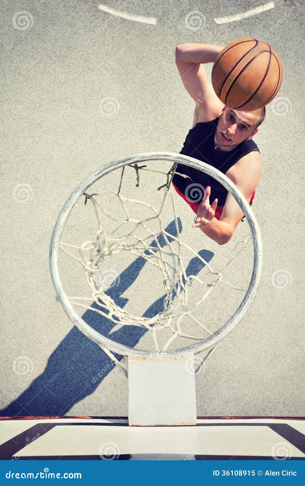 Basketball Player in Action Flying High and Scoring Stock Image - Image ...
