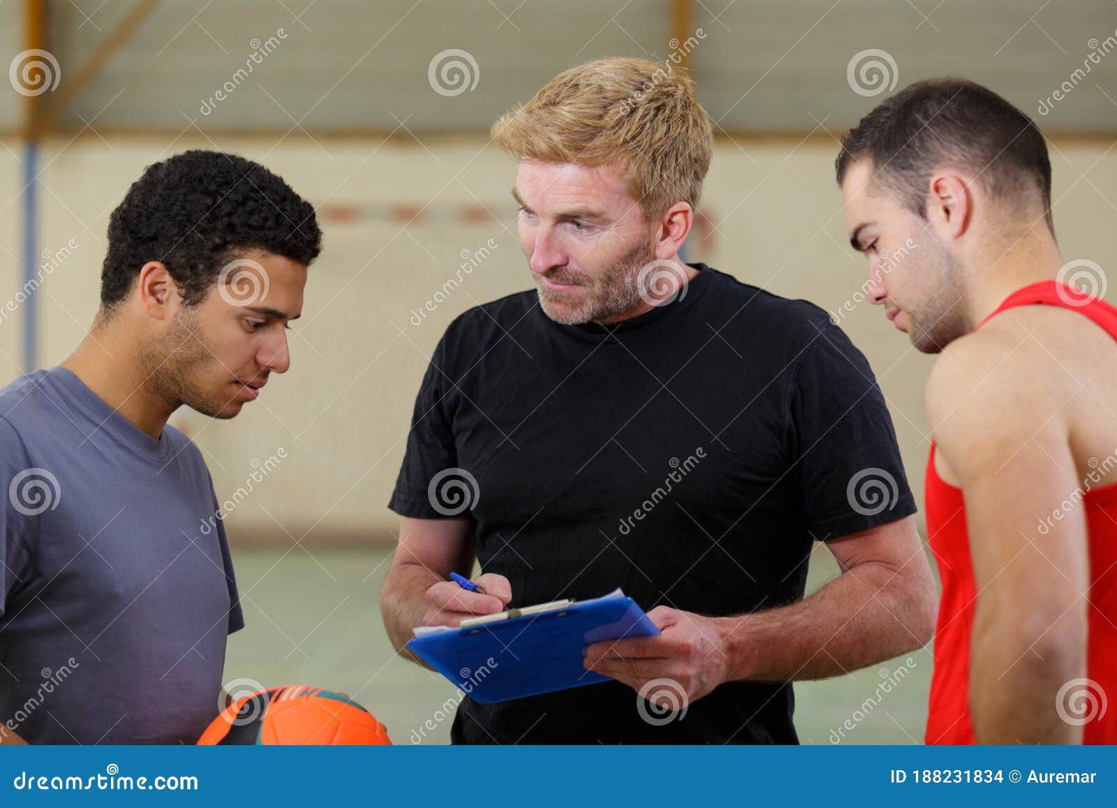 Basketball Player and Coach Talking about Game Tactics Stock Photo ...