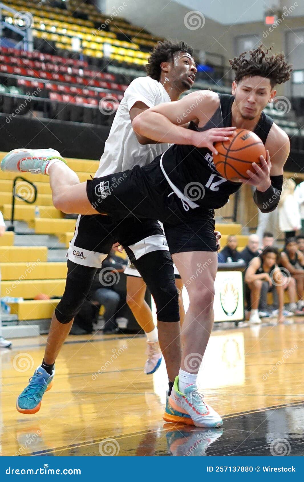 Basketball Player Dribbling the Ball into the Hoop Editorial Image ...