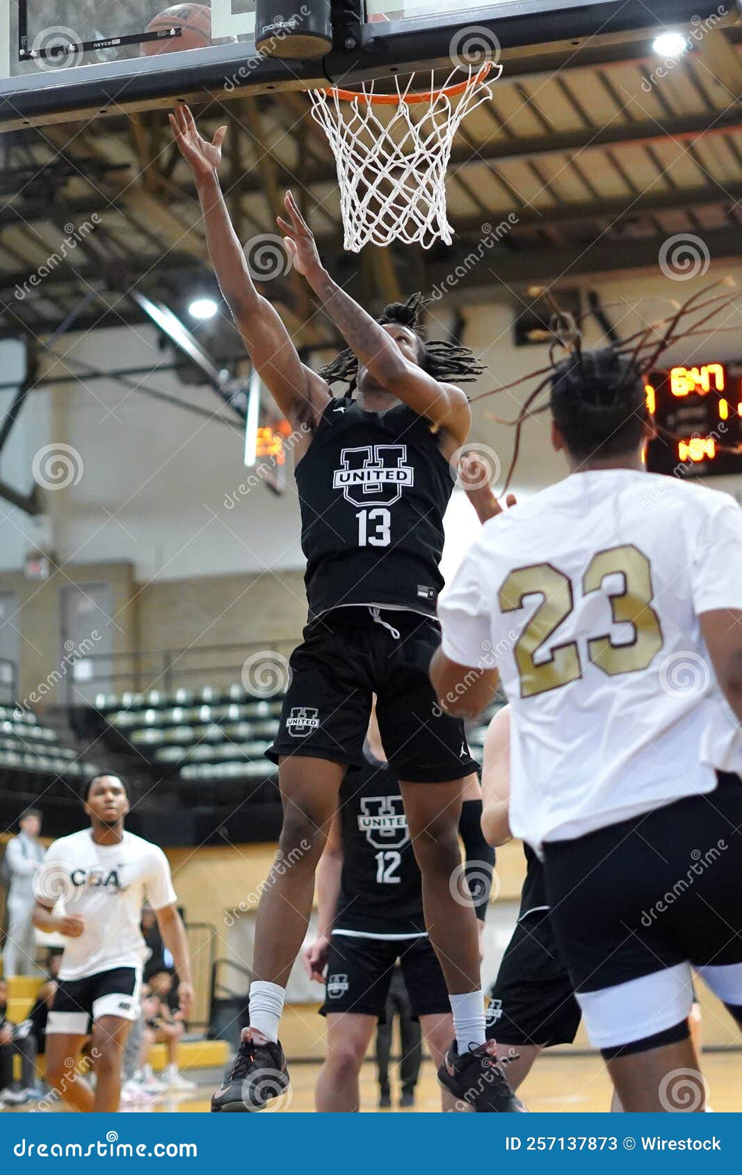 Basketball Player Dunking the Ball into the Hoop Editorial Stock Photo ...