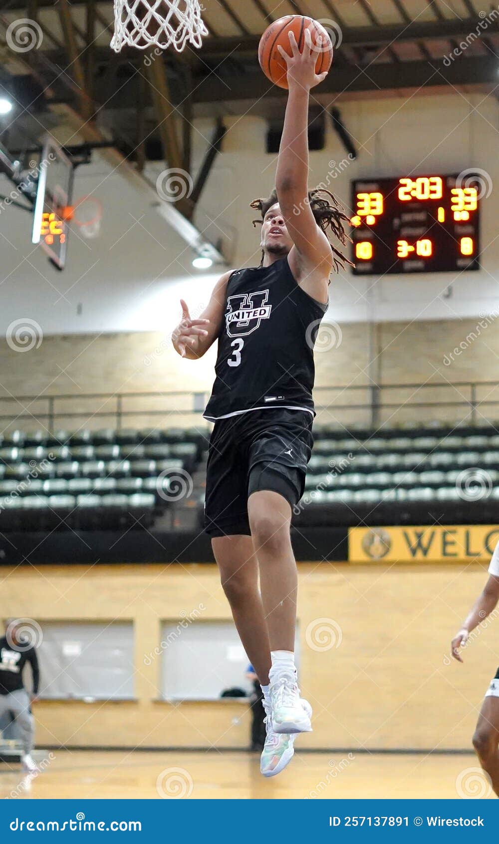 Basketball Player Dunking the Ball into the Hoop Editorial Photo ...