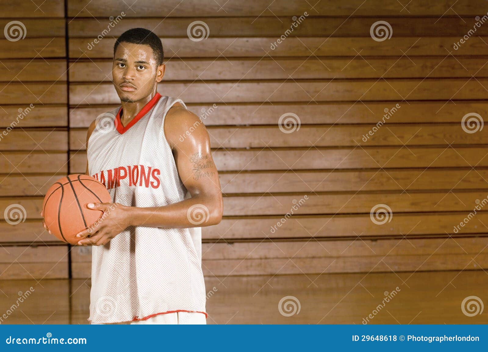 Basketball Player Holding Ball Stock Photo - Image of active, lifestyle ...