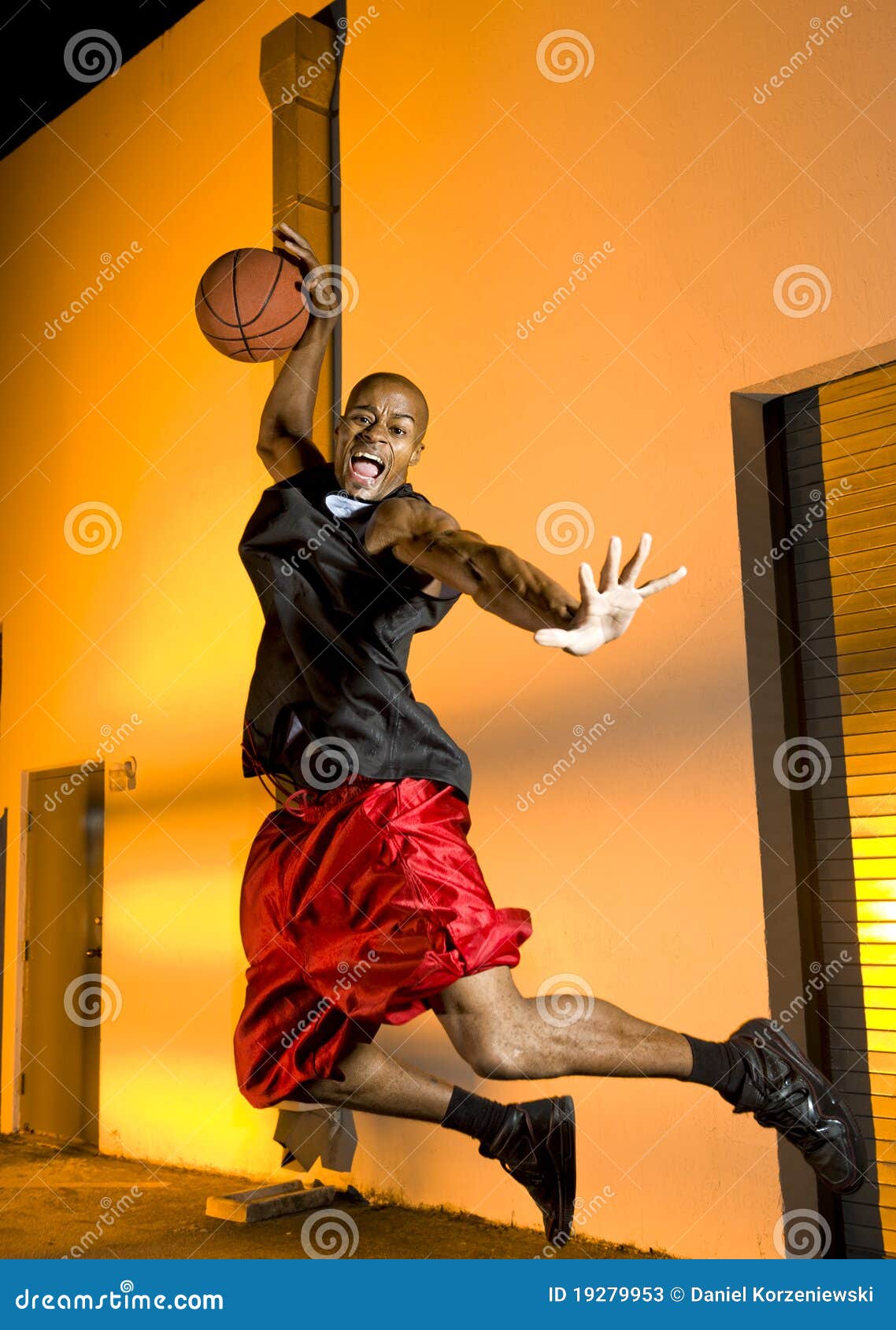 Basketball Player Jumps with Ball Stock Image - Image of basketball ...